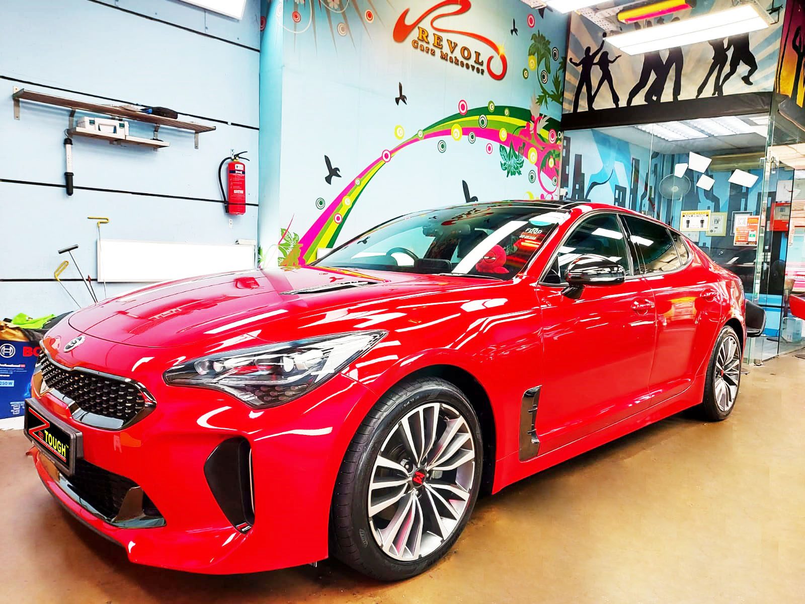 This beautiful red Kia Stinger with Ceramic Paint Protection Coating!